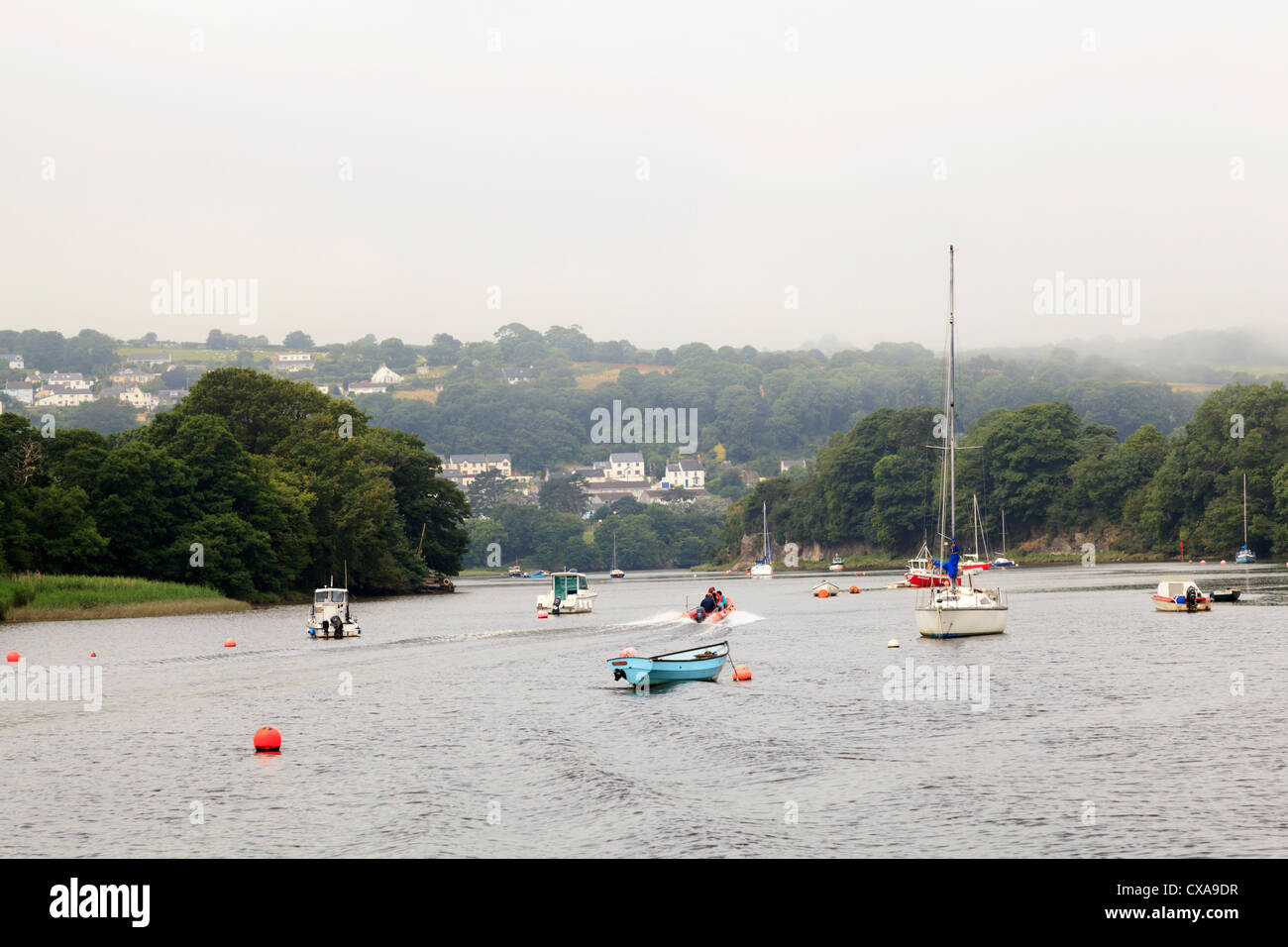 Boats on the river Teifi in Cardigan town. This Area of the town is ...