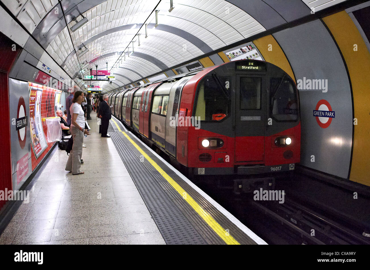 A lonon underground train arrives at green park underground station on ...