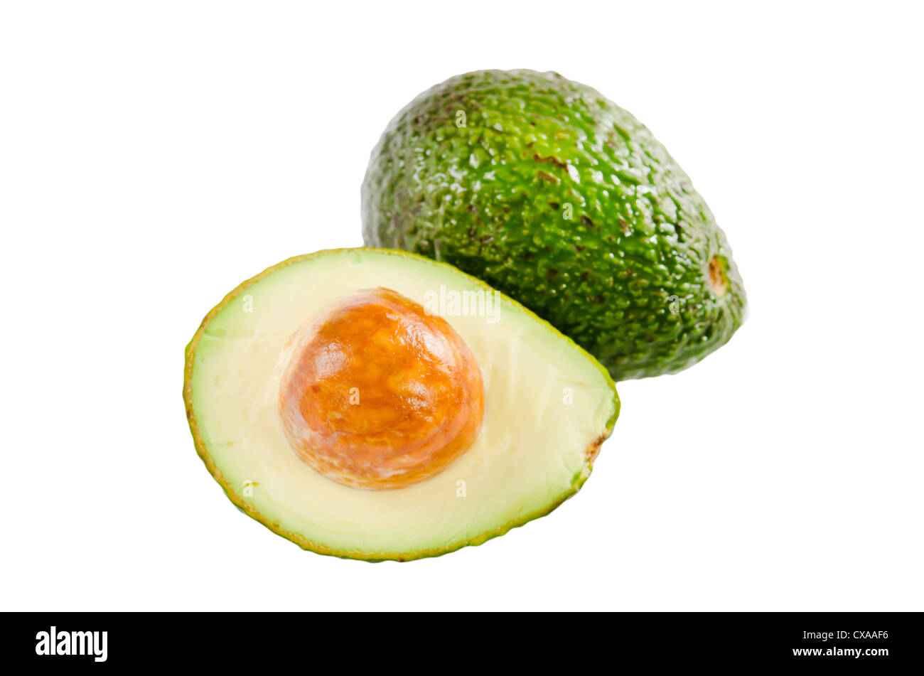 green ripe avocado and half on white background Stock Photo - Alamy