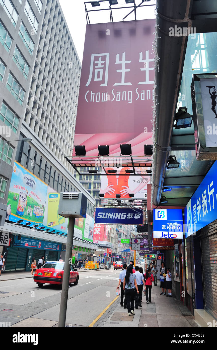Street view with traffic and shops Stock Photo - Alamy