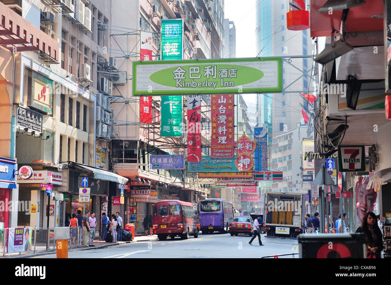 Street view with traffic and shops Stock Photo - Alamy
