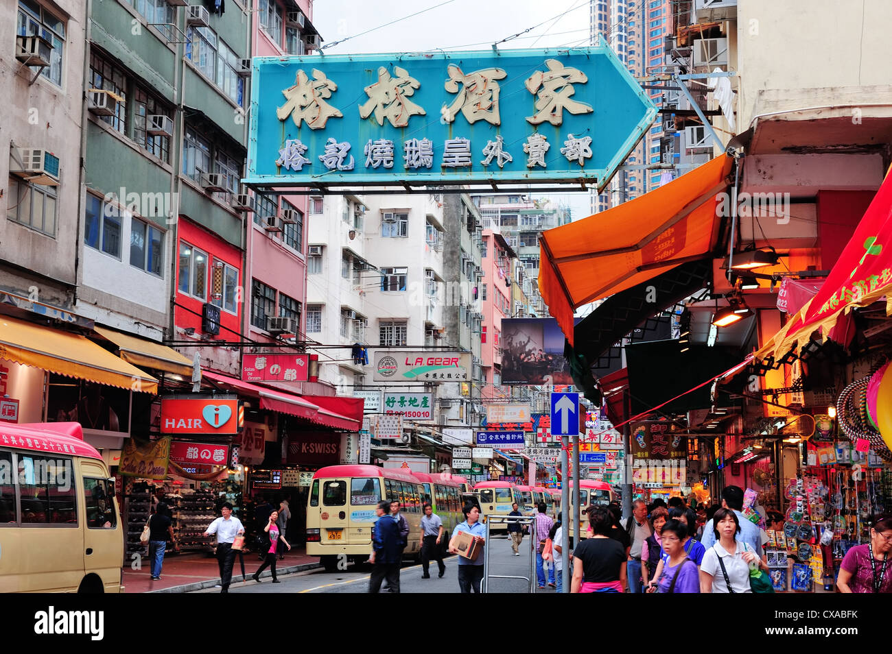 Street view with traffic and shops Stock Photo - Alamy