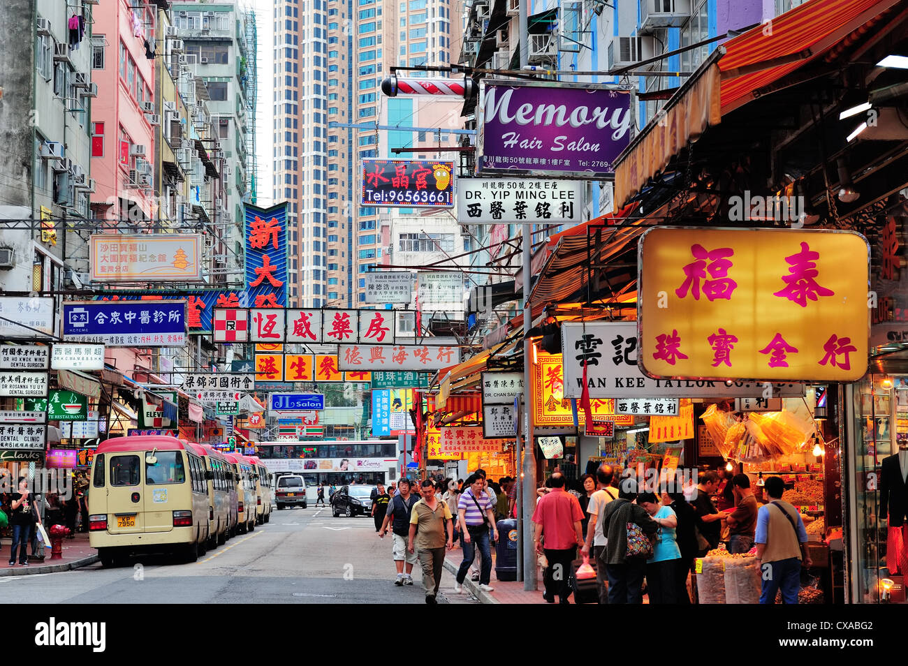 Street view with traffic and shops Stock Photo - Alamy