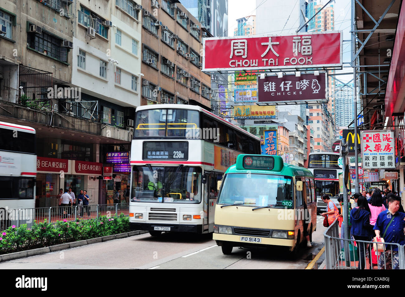 Street view with traffic and shops Stock Photo - Alamy