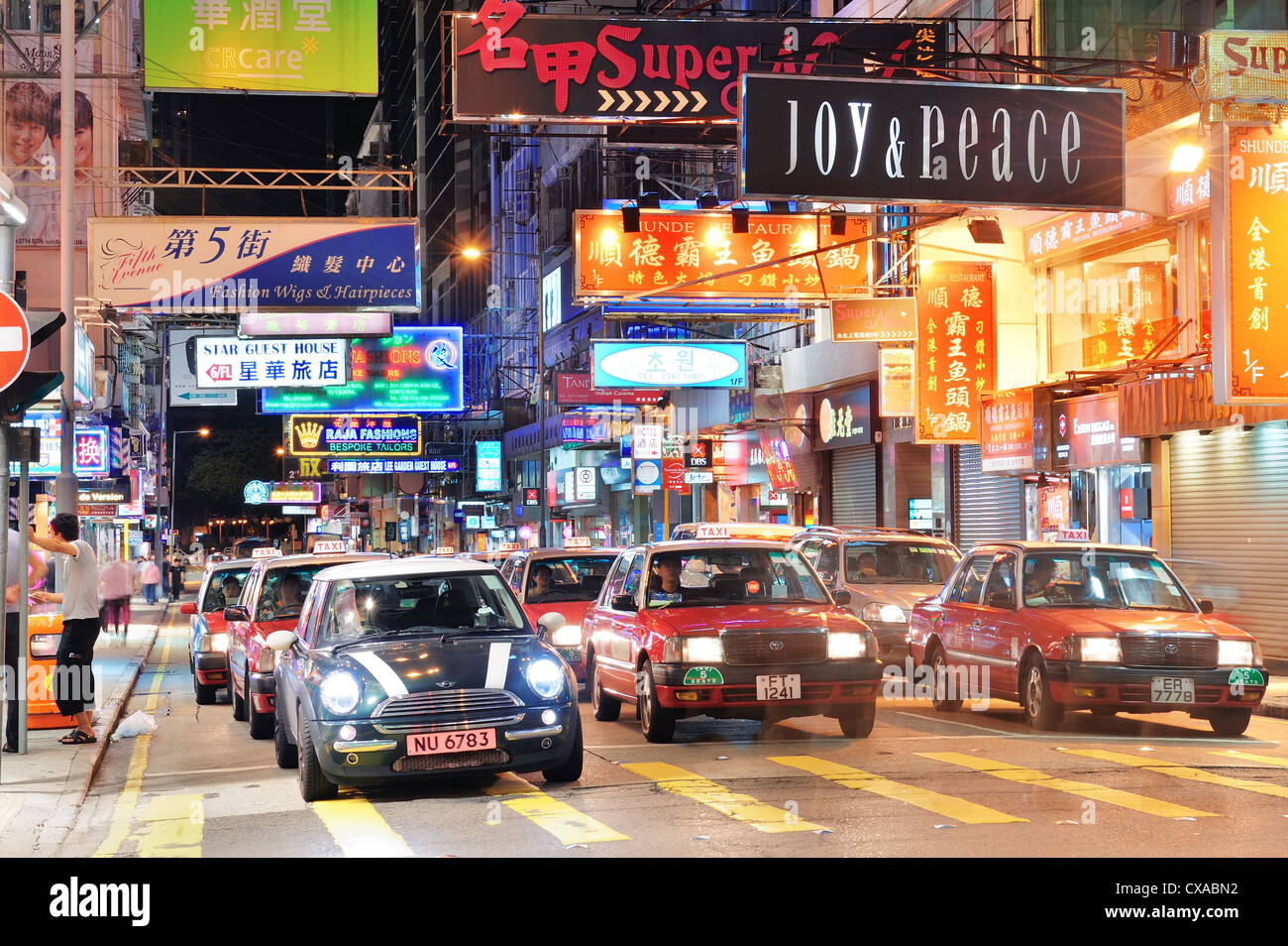 Crowded street view at night Stock Photo - Alamy
