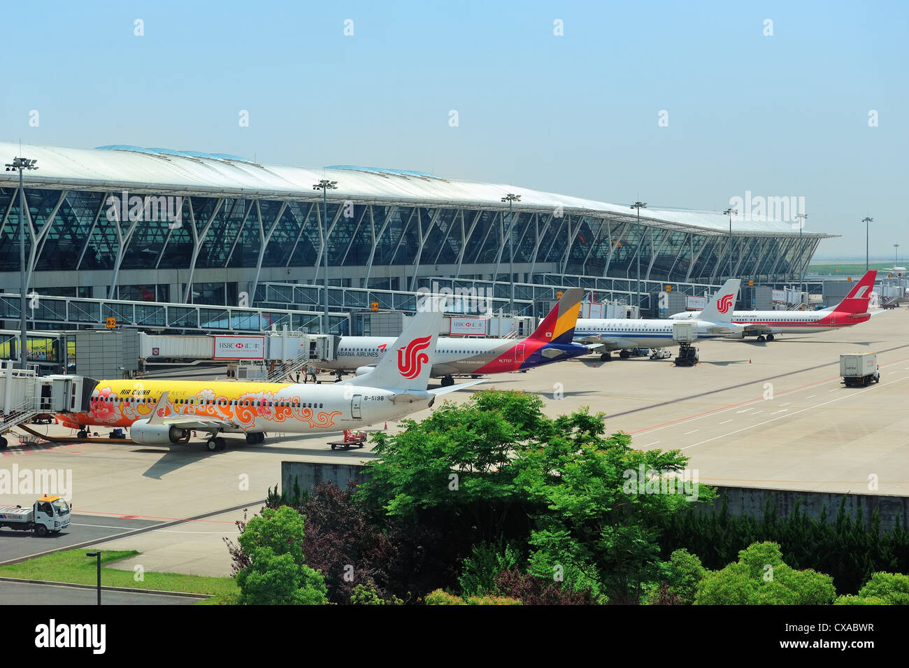 Airplane at terminal Stock Photo - Alamy