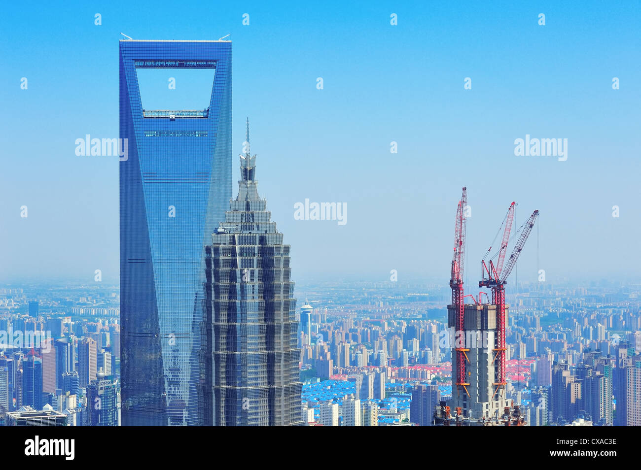Shanghai city aerial view with urban architecture and blue sky in the ...