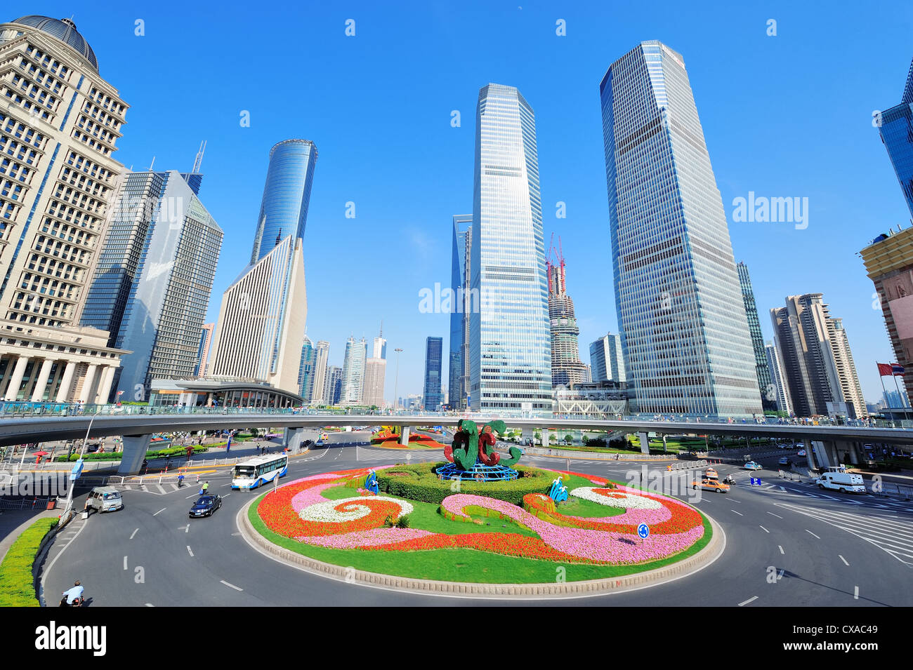Shanghai street view with skyscrapers, roundabout and blue sky Stock ...