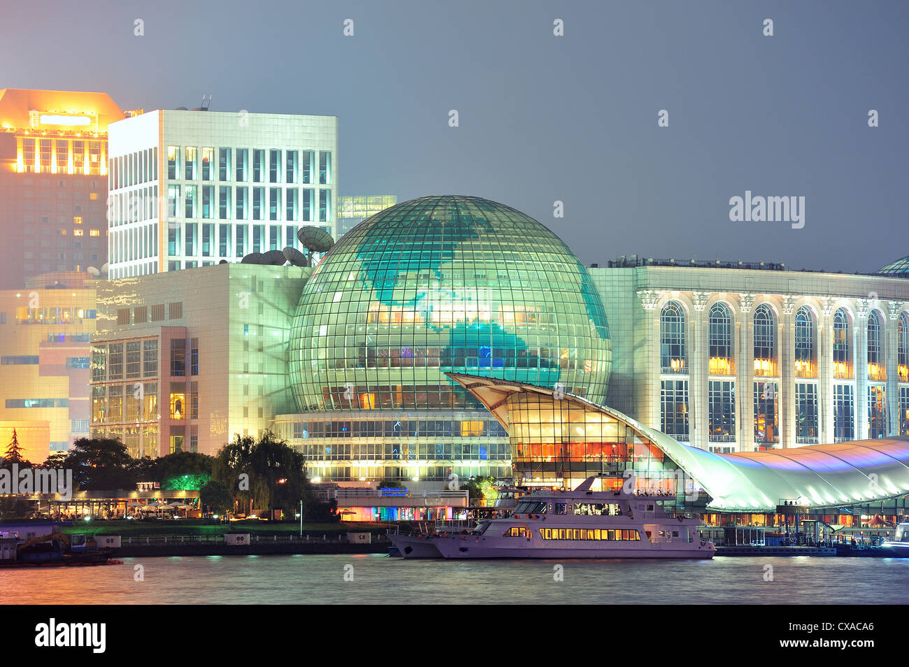 Shanghai urban architecture over river at dusk Stock Photo - Alamy