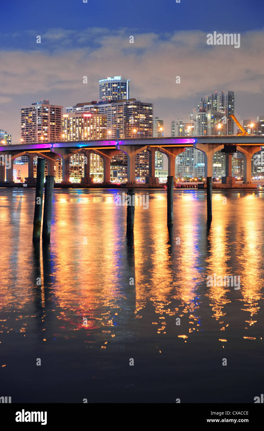 Miami city skyline panorama at dusk with urban skyscrapers and bridge ...