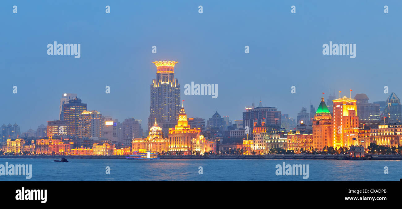Shanghai urban architecture over river at dusk Stock Photo - Alamy