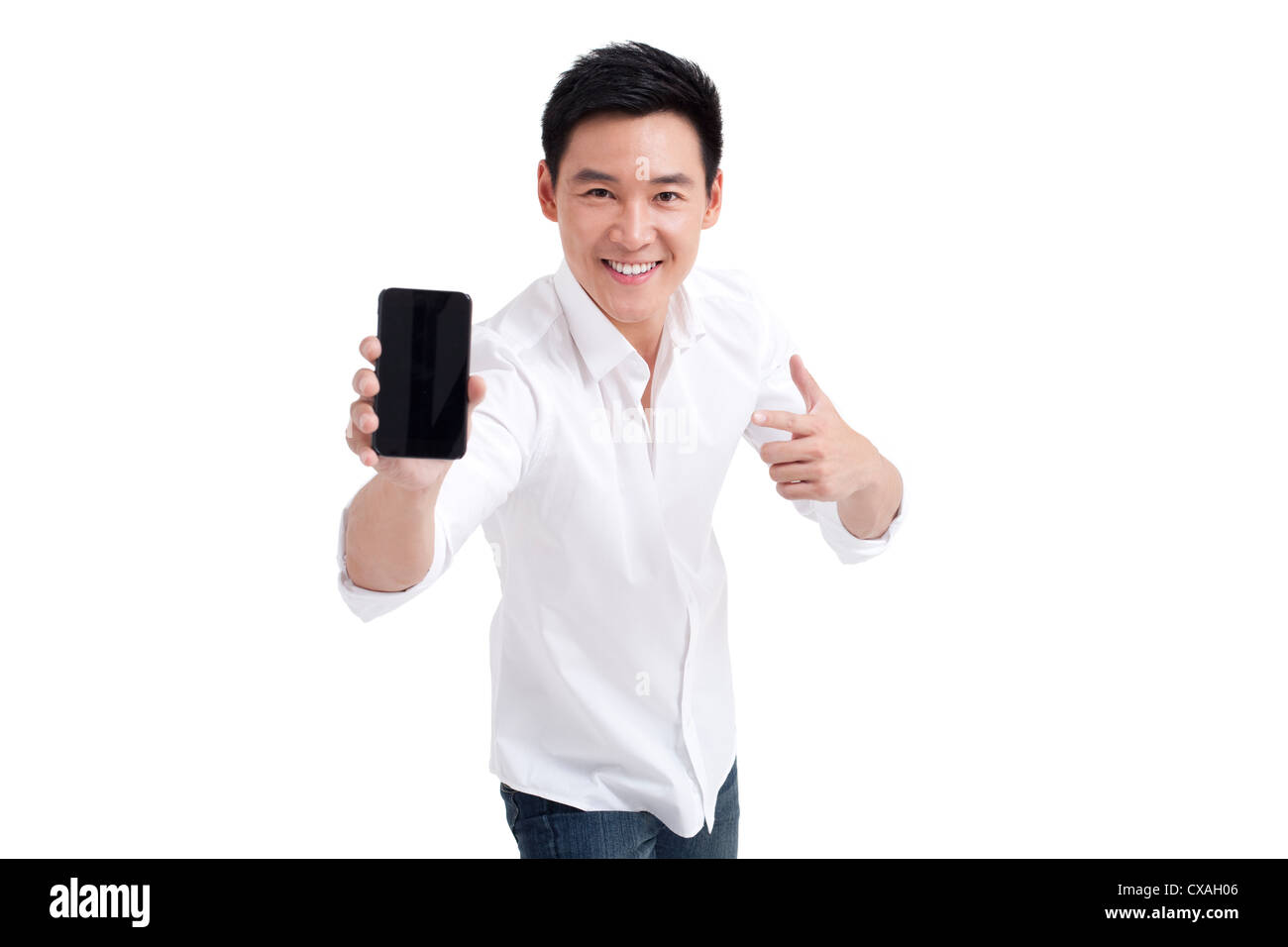 Young man showing mobile phone Stock Photo - Alamy