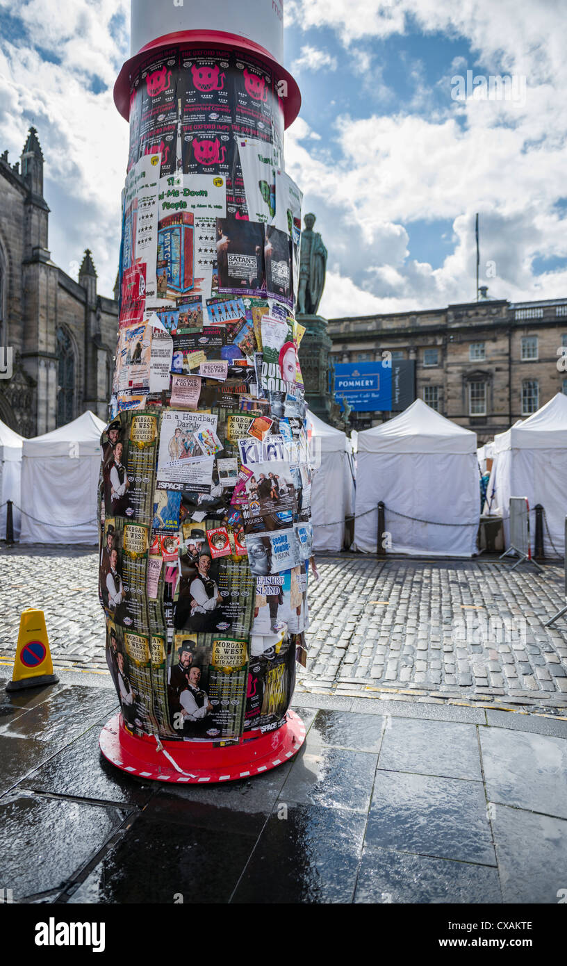 Show posters covering post on the Royal Mile at the 2012 International ...