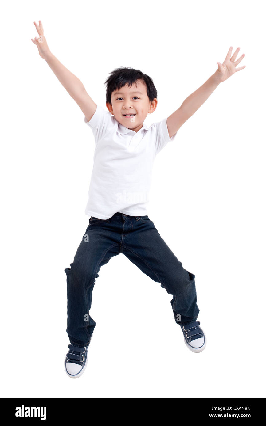 Young boy jumping in mid-air Stock Photo - Alamy