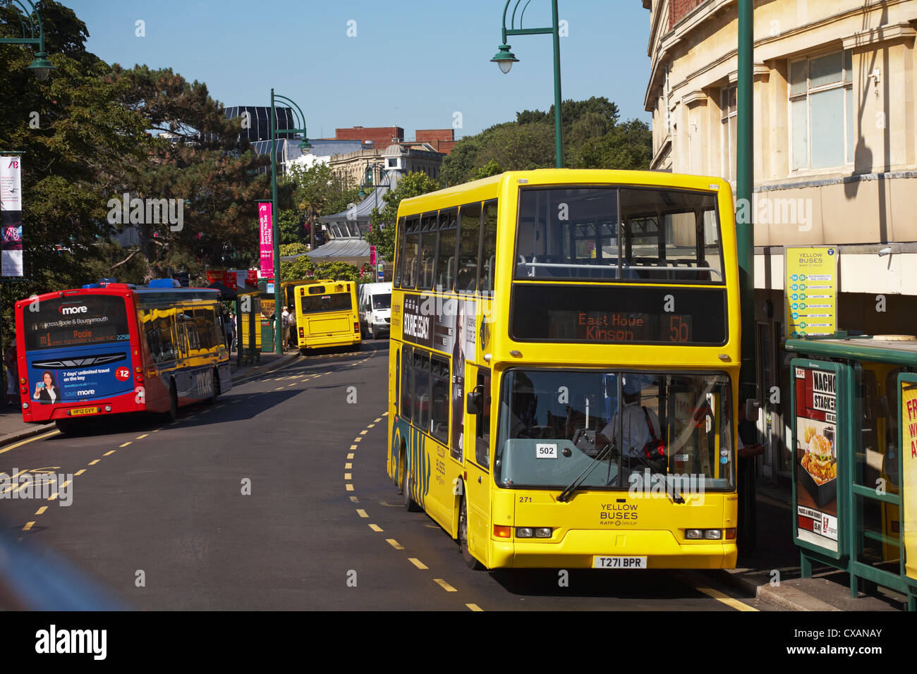 Yellow buses and More Wilts & Dorset buses at Bournemouth Stock Photo ...