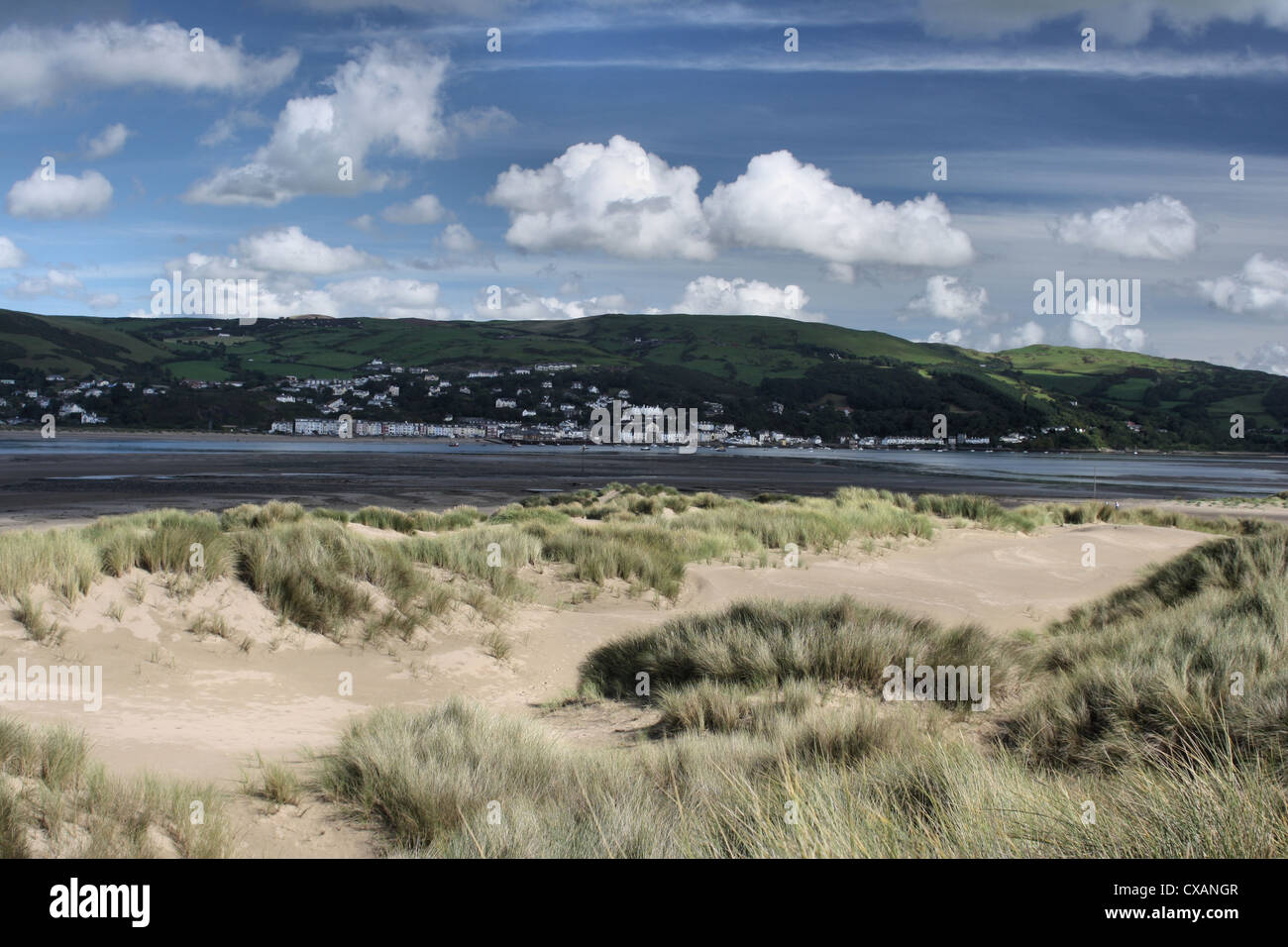 Aberdyfi from sand dunes on Borth beach at low tide in summer Stock ...