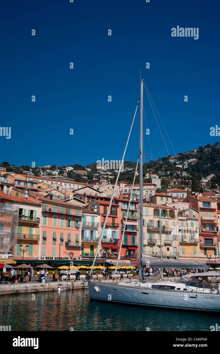 Colourful buildings along waterfront, Villefranche, Alpes-Maritimes ...