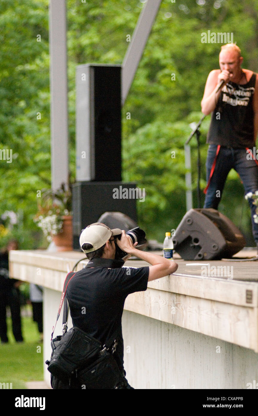 professional photographer photographing a live rock band photo photos ...