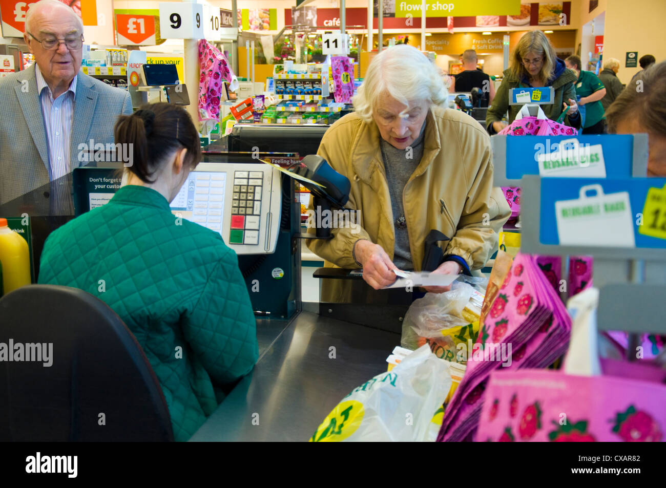 Morrisons Store of the Future concept an elderly senior woman at ...