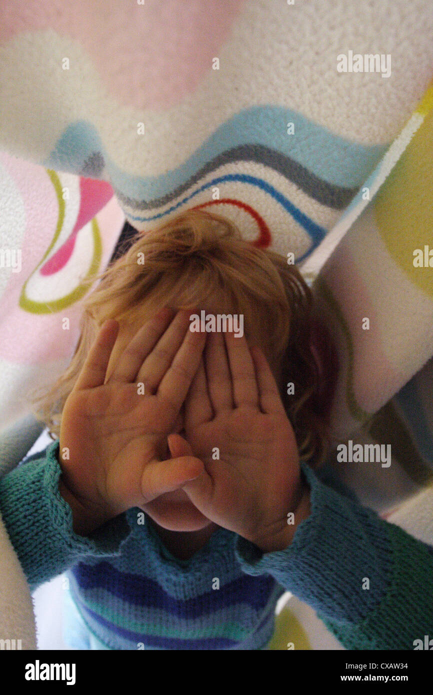Andalusia, girl hiding Stock Photo - Alamy