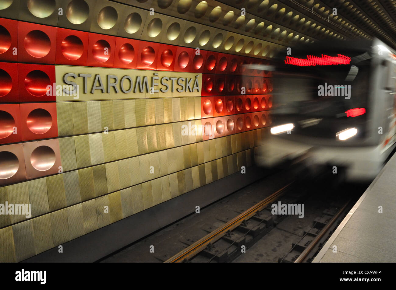 A moving tube train entering a station in Prague, Czech Republic Stock ...