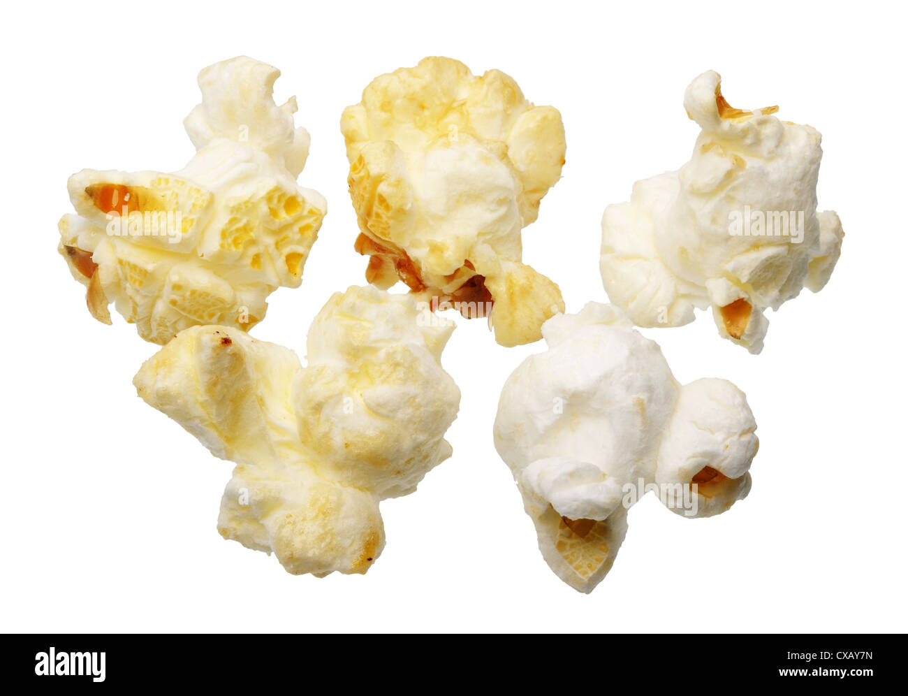 Few grains of popcorn, isolated on a white background Stock Photo - Alamy