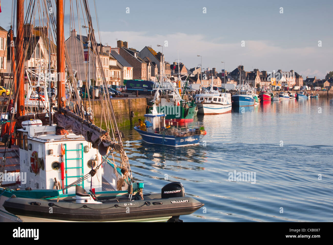 The Fleur de Lampaul, and small boat in the harbour at Saint Vaast La ...