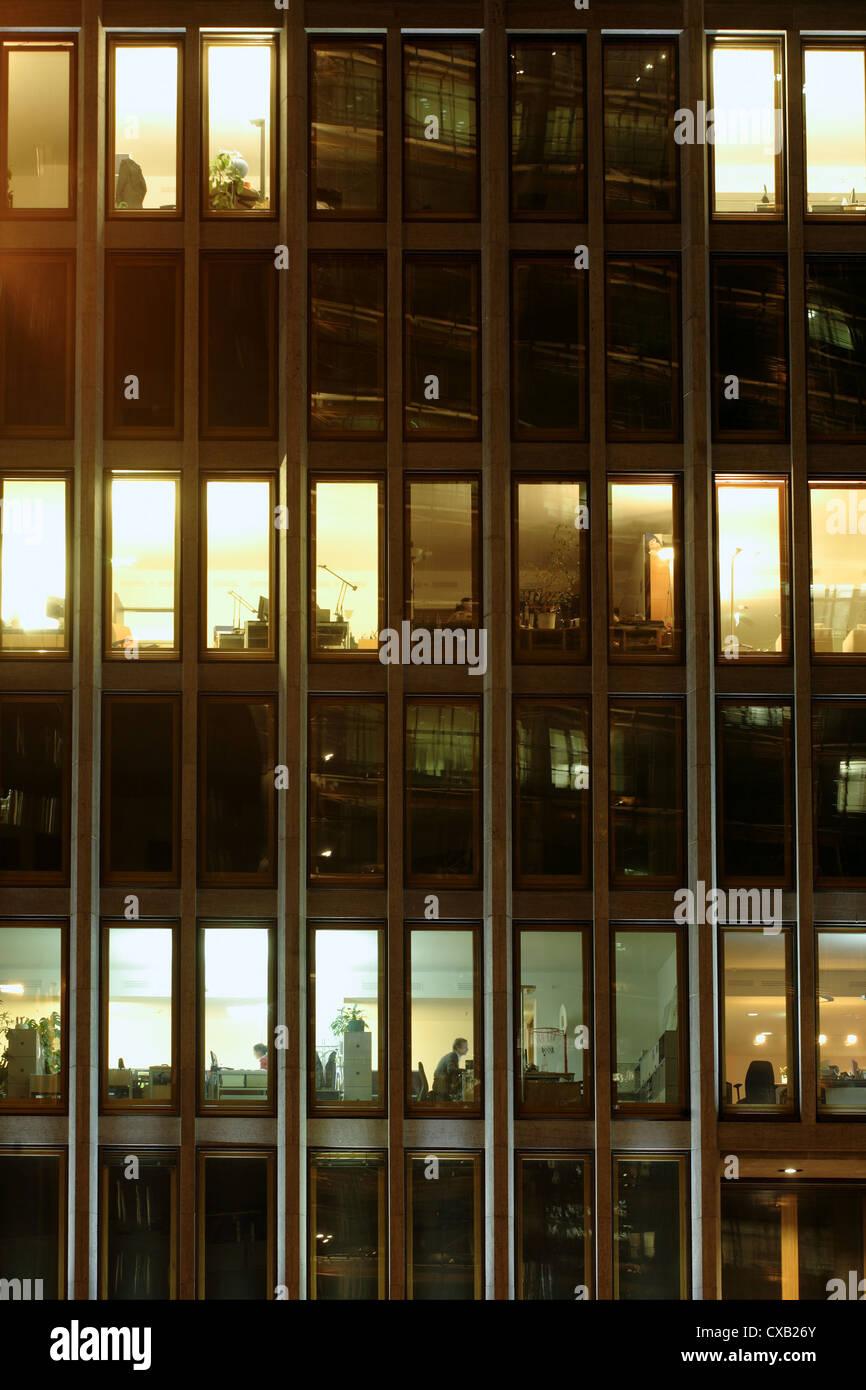 Glowing windows of a Buerogebaeudes Stock Photo - Alamy