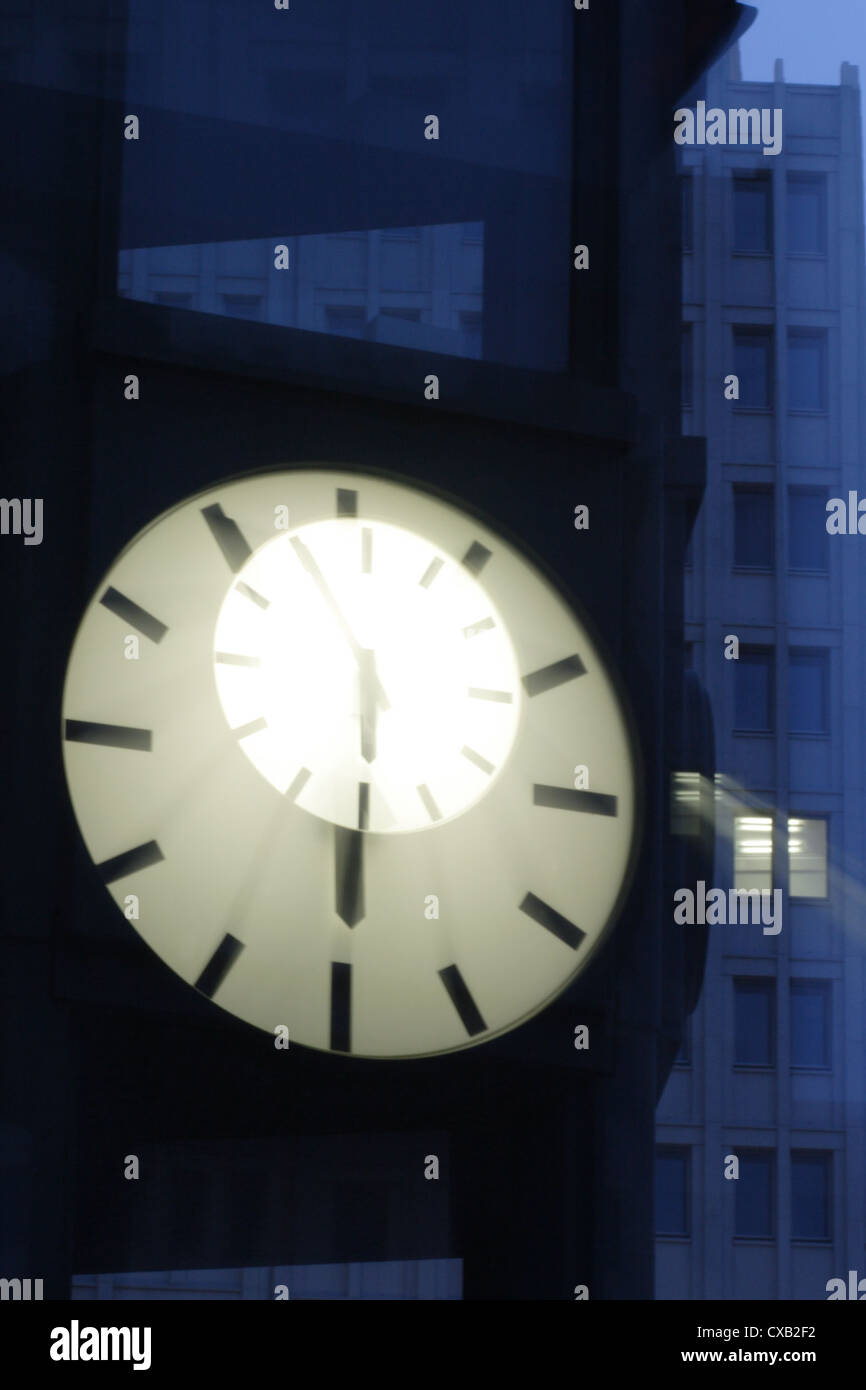 Radiant Clock and office building Stock Photo - Alamy