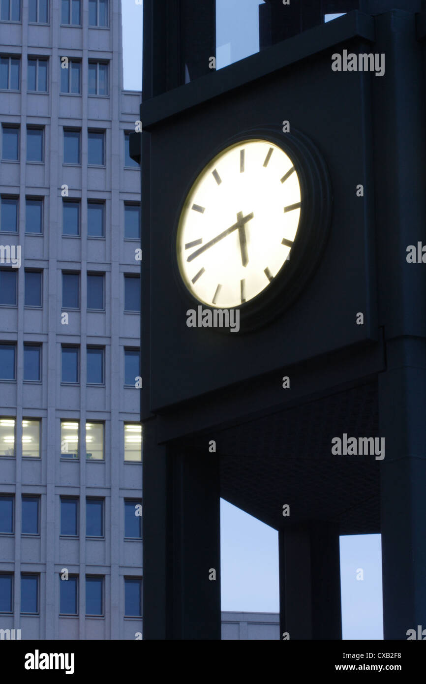 Radiant Clock and office building Stock Photo - Alamy