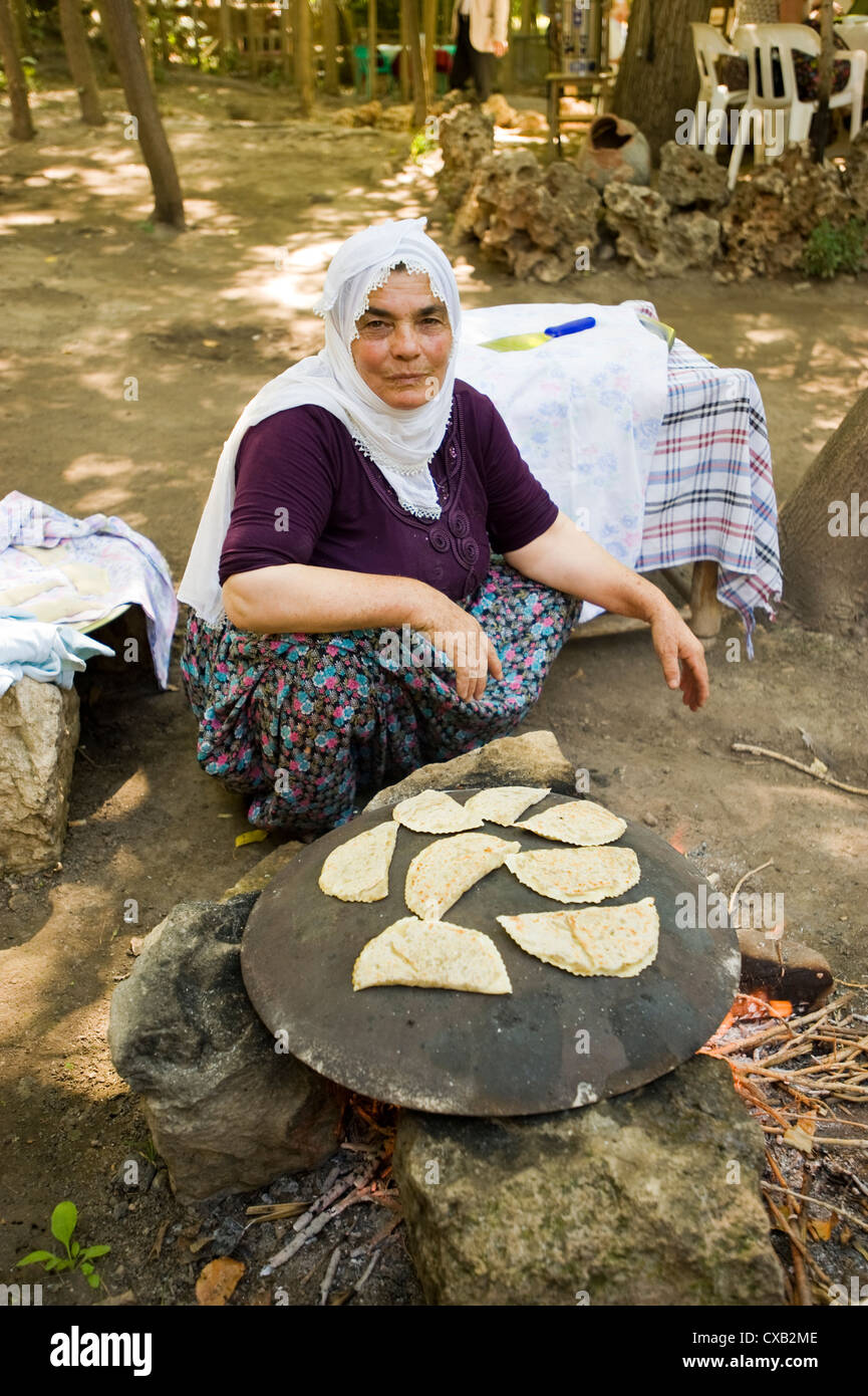 Turkish Arabic woman cooking patty, Mardin Turkey Stock Photo - Alamy