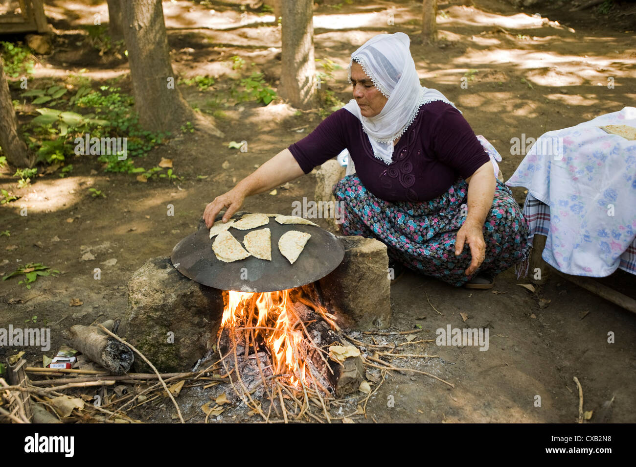 Turkish Arabic woman cooking patty, Mardin Turkey Stock Photo - Alamy