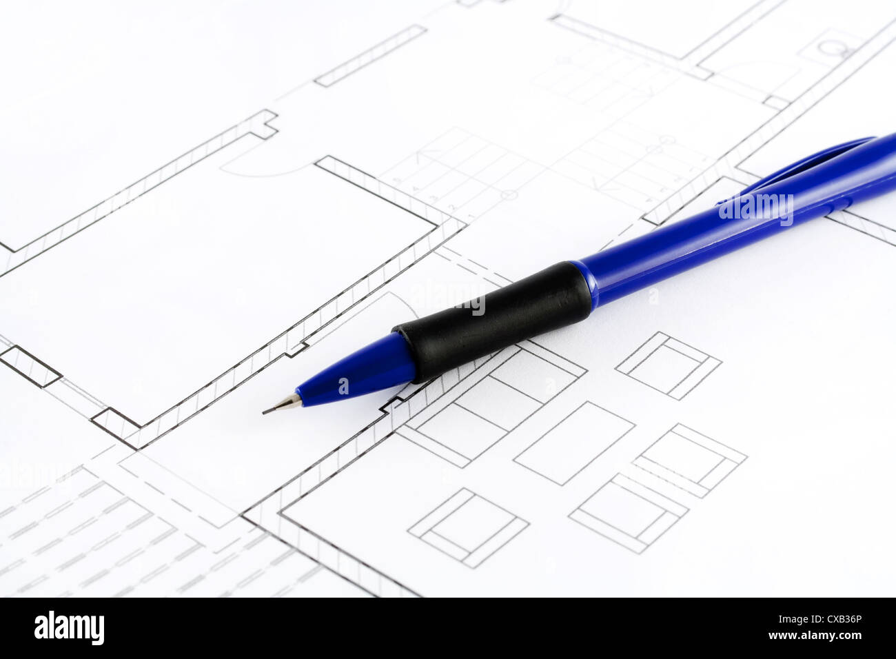 Architecture blueprint and blue pencil on a paper Stock Photo - Alamy