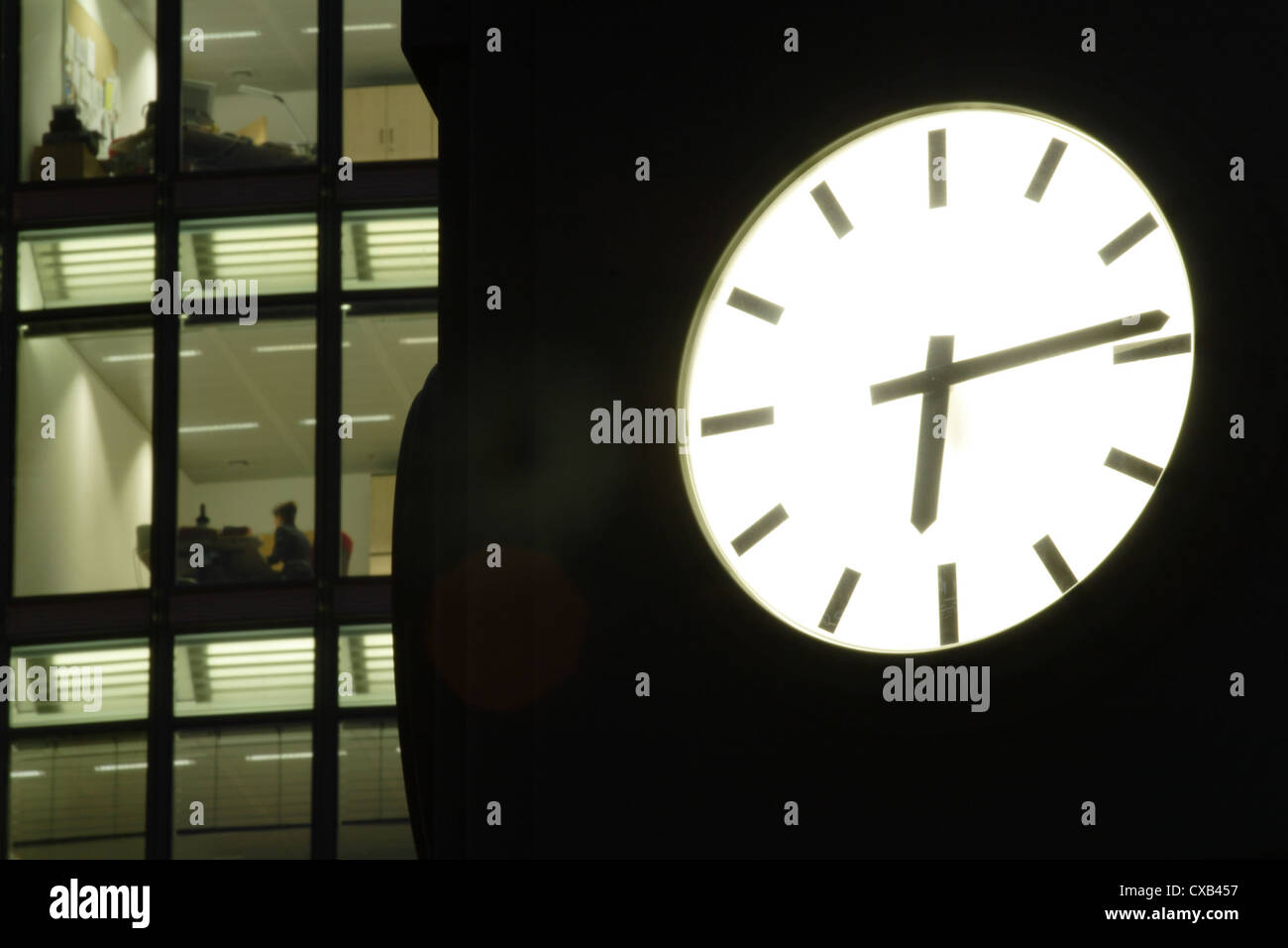 Radiant Clock and office building Stock Photo - Alamy