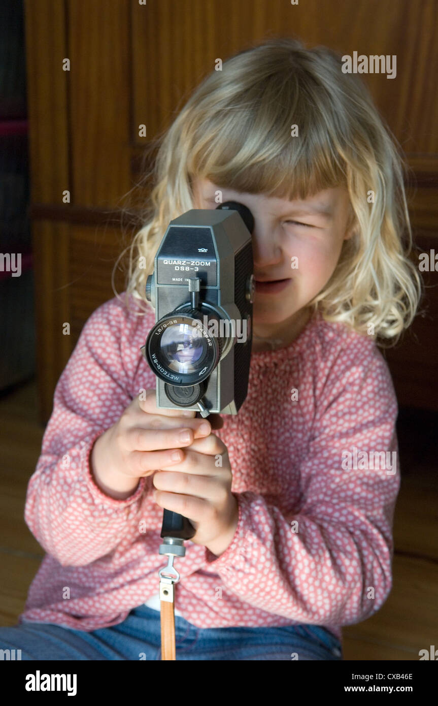 Child with film camera hi-res stock photography and images - Alamy