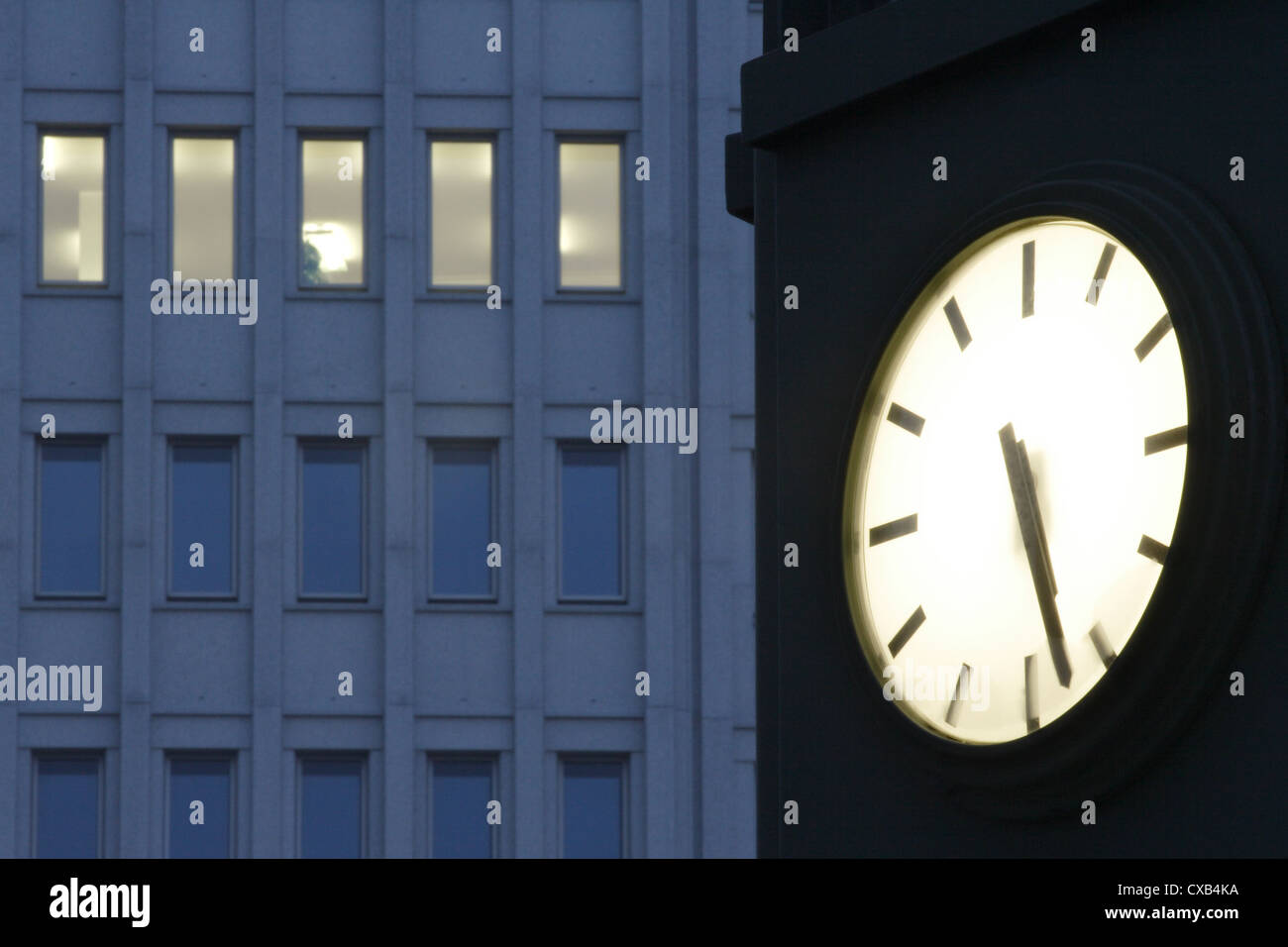 Radiant Clock and office building Stock Photo - Alamy