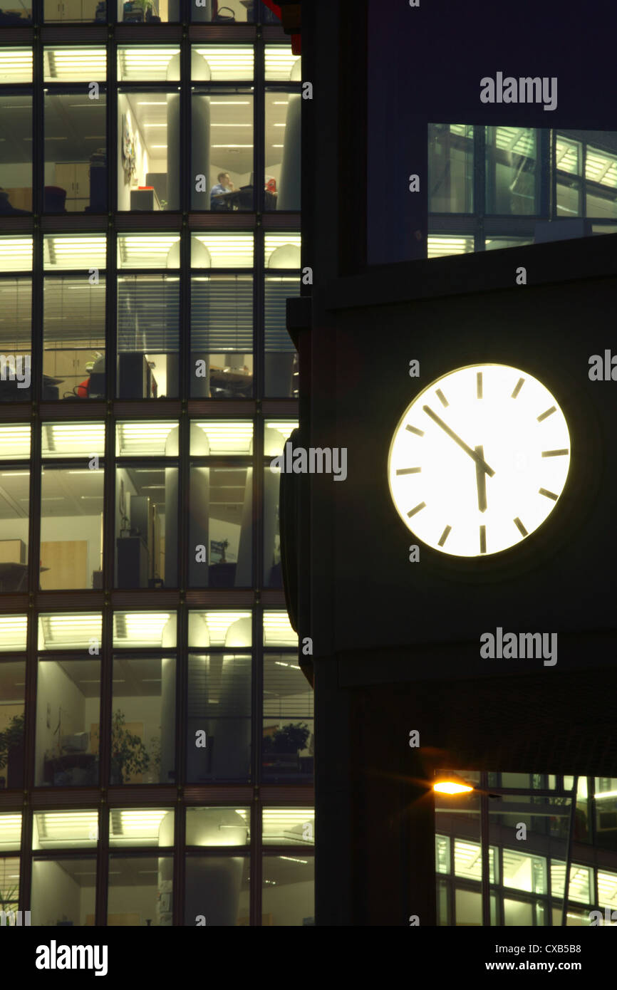 Radiant Clock and office building Stock Photo - Alamy