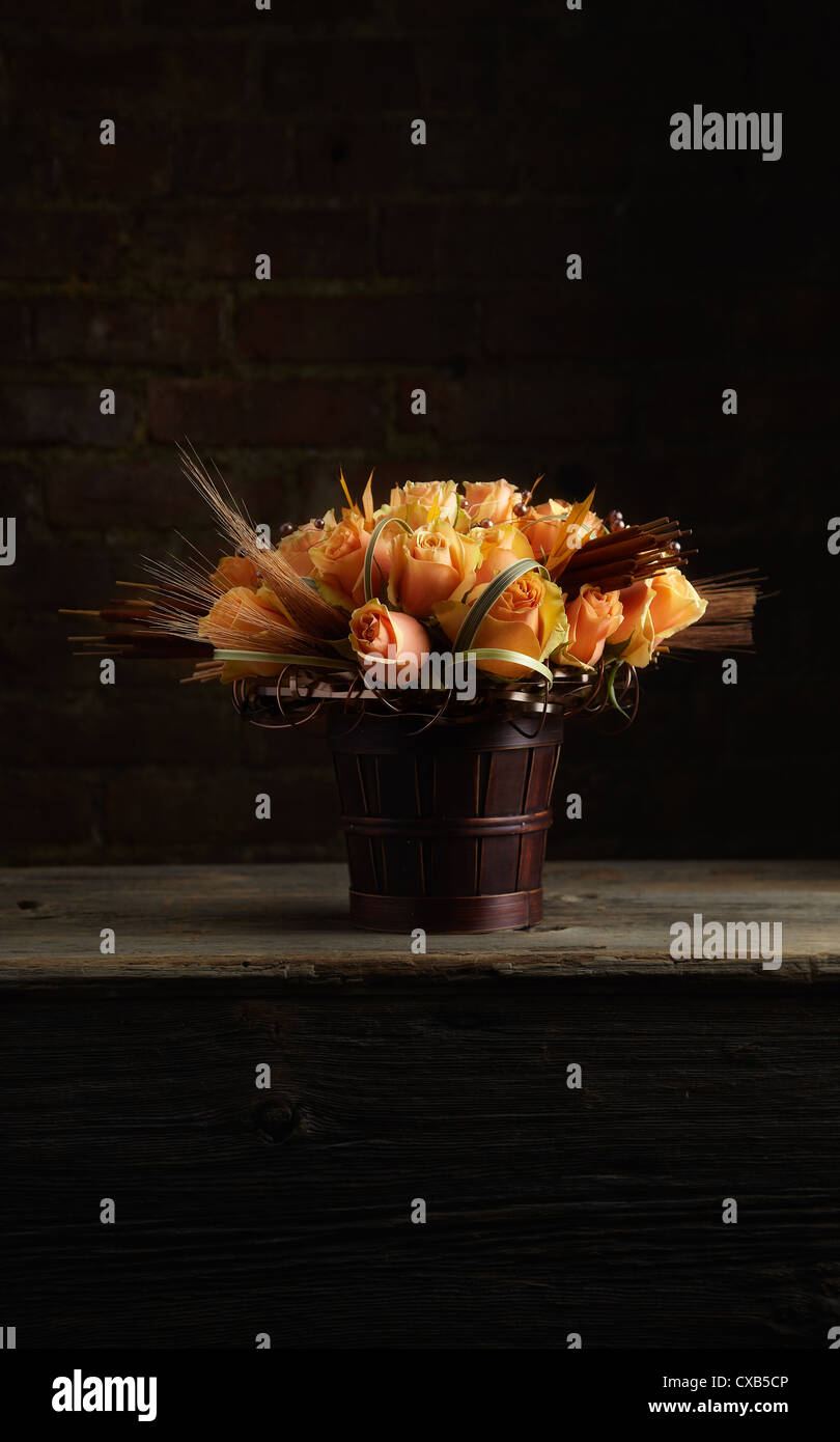 Peach Rose Fall Flower Arrangement Stock Photo - Alamy