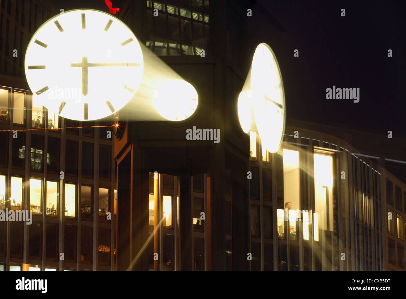 Radiant Clock and office building Stock Photo - Alamy