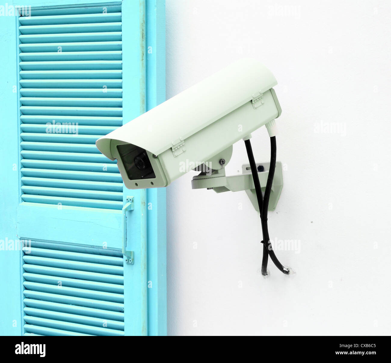 CCTV with window on wall Stock Photo - Alamy