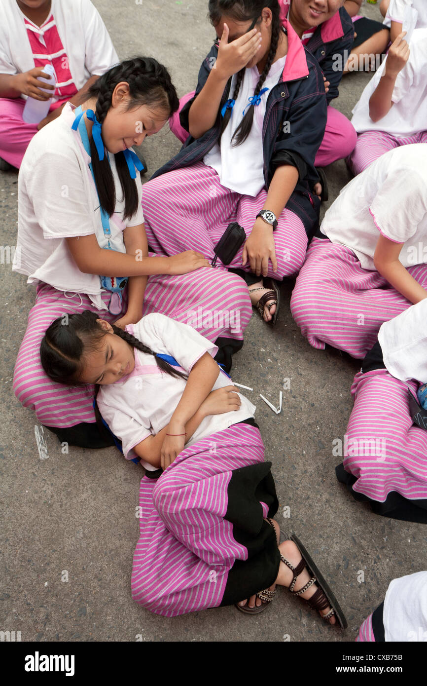 Shy girl in a group of friends hi-res stock photography and images - Alamy