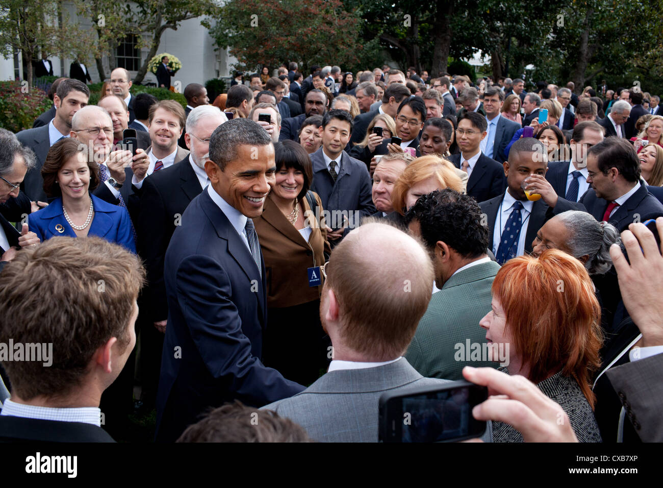 US President Barack Obama drops by a reception celebrating the signing ...