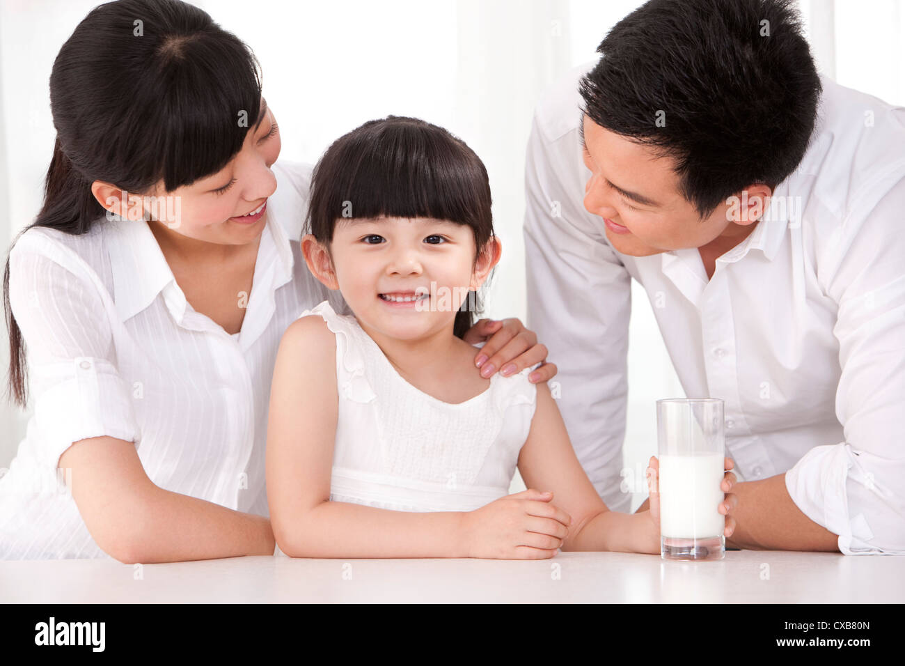 Healthy family and milk Stock Photo - Alamy