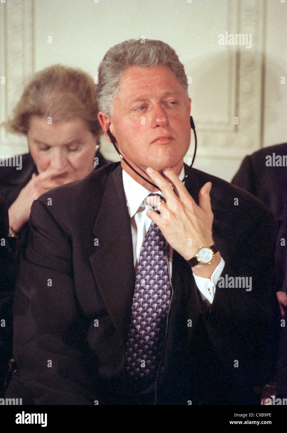 US President Bill Clinton listens to PLO leader Yasser Arafat speak ...