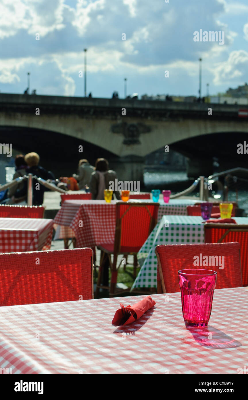 Prepared Tables in Paris restaurant on the river Seine shore Stock ...
