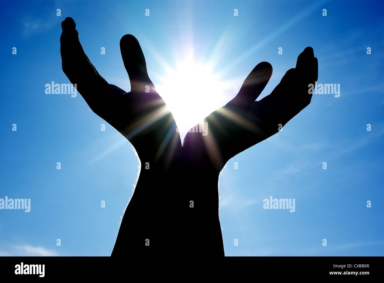 Sun in hands. Conceptual design Stock Photo - Alamy
