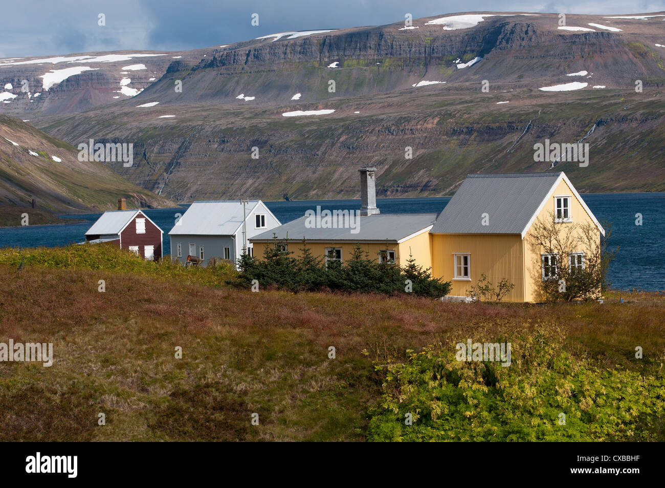 A photograph of the Old houses in the abandoned village of Hesteyri in ...