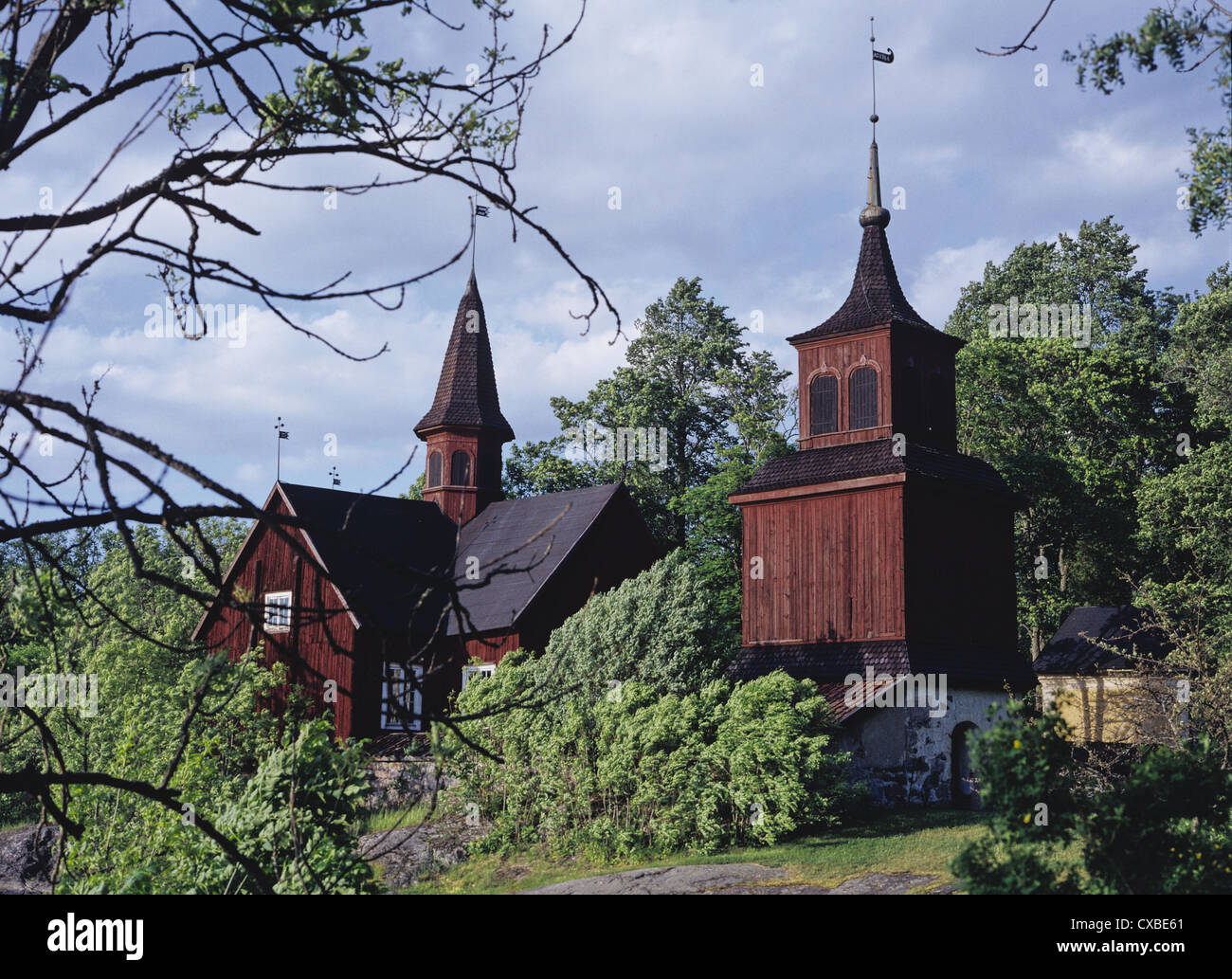 The red wooden church and belfry of the Fagervik Iron Works was ...
