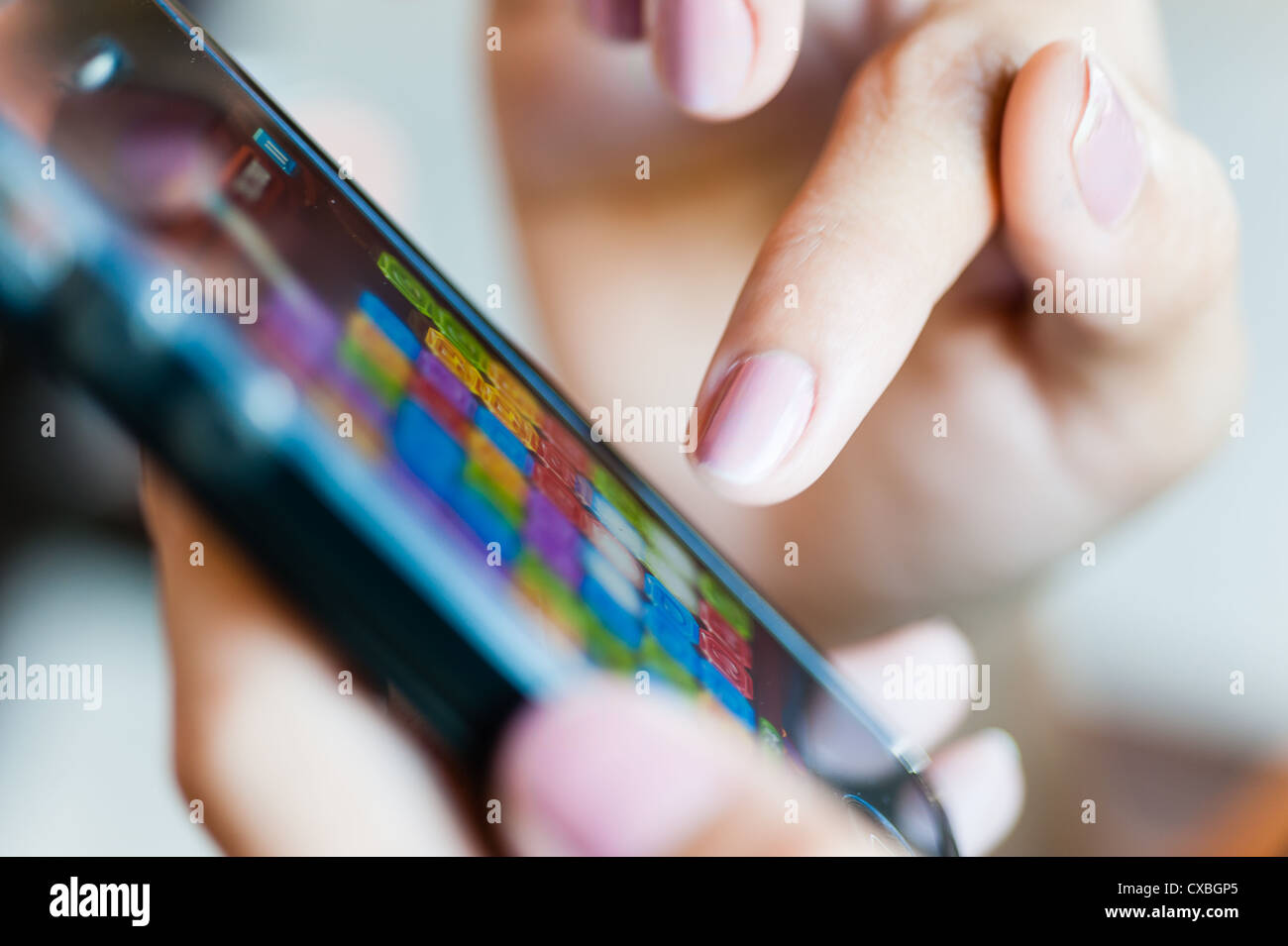 Girl finger touching screen on mobile smart phone Stock Photo - Alamy