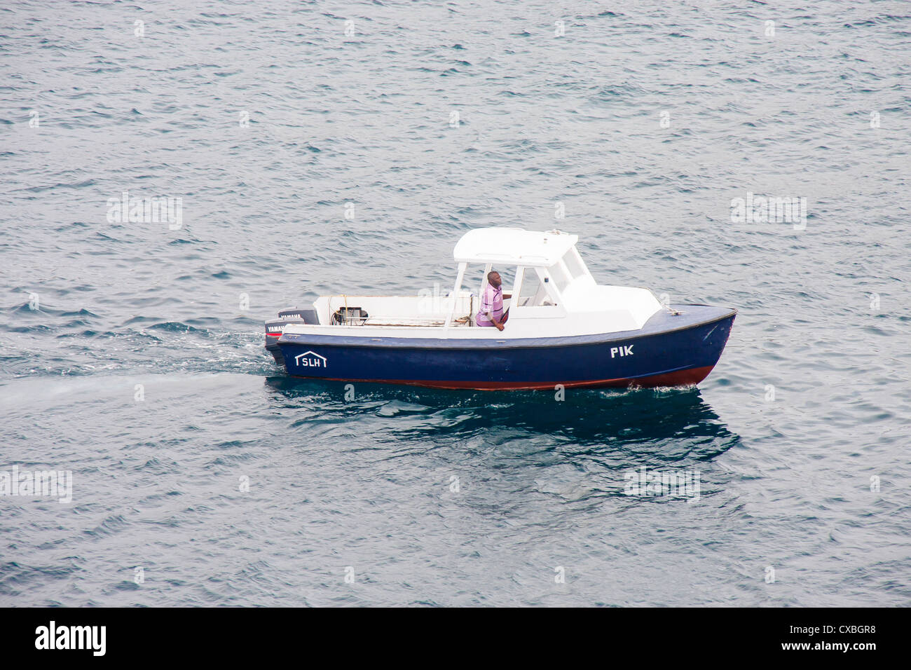 Man piloting a boat hi-res stock photography and images - Alamy